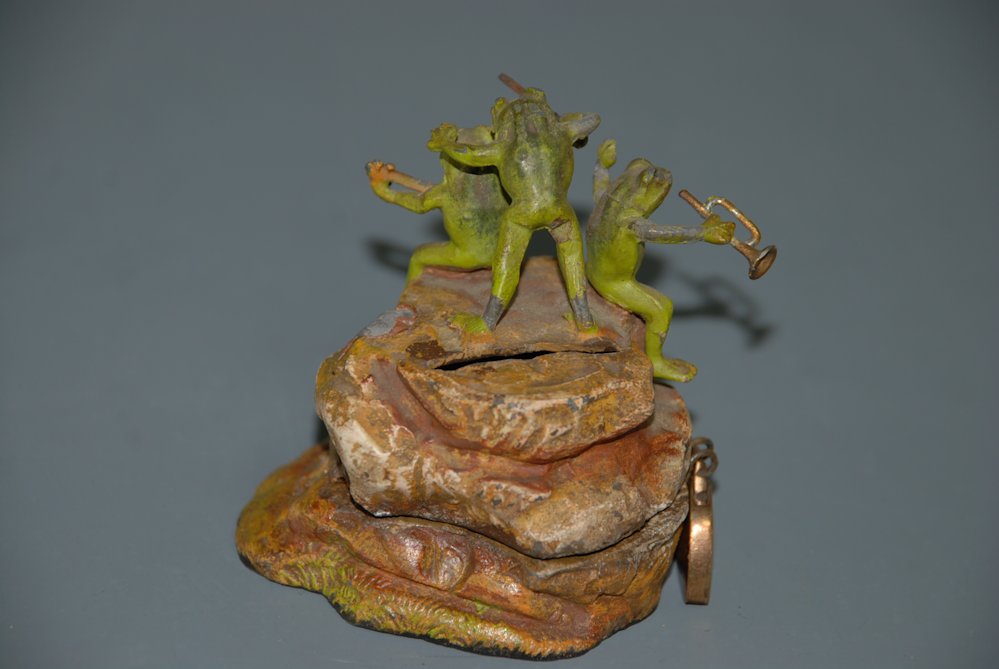 antique metal cast money box * frogs on stone playing instruments ...